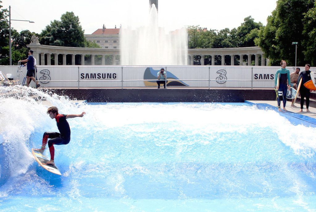 The surfers demonstrating their skills on the artificial wave ...